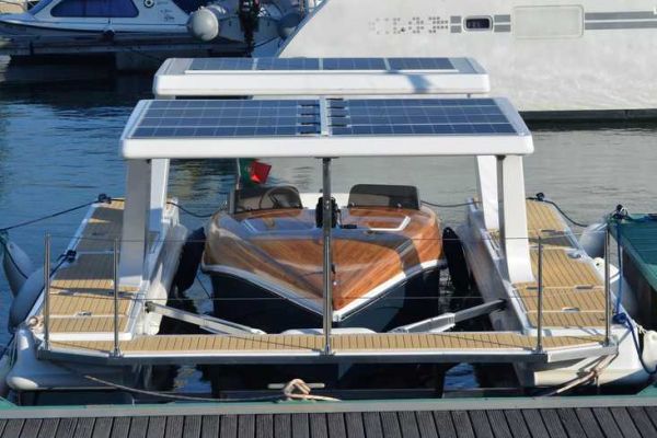 An autonomous solar dock for recharging and storing electric boats