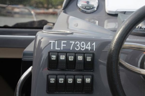 What do these big numbers mean next to the steering wheel of this boat?